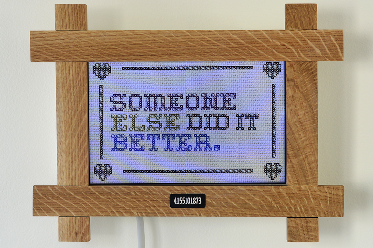 A digital cross stitch picture created with a Raspberry Pi - Raspberry Pi Pod and micro:bit base